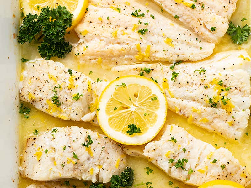Baked Haddock with Onions, Herbs and Lemon Recipe - Samsung Food