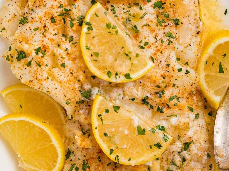 Whole baked turbot with lemon and herbs Recipe — Samsung Food